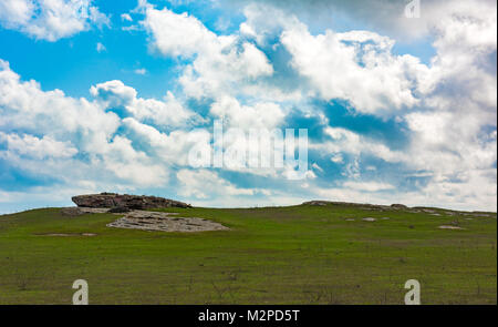 Rocks fragments in the highlands, green meadow Stock Photo - Alamy