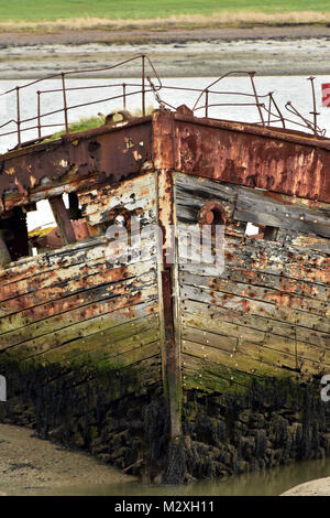 Sunken shipwreck of rotting hull boat in Newhaven Harbour East Sussex ...