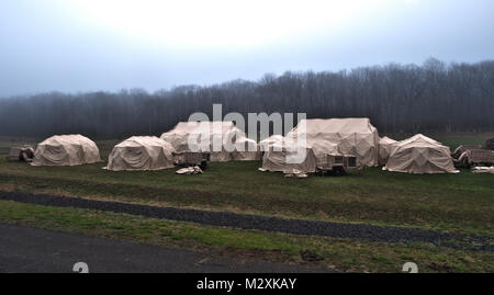 An HDR of large and medium Trailer Mounted Support System tents being ...