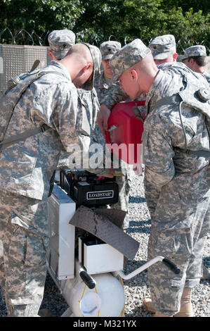 Pfc. Casey A. Whitaker, of Clearfield, Pa., a Power Generator Equipment ...