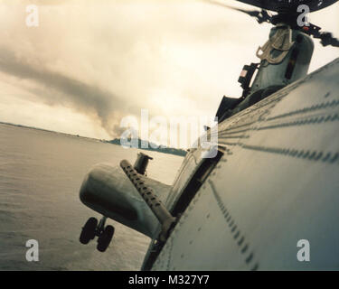 An HMM-162(REIN) CH-46E departs the U.S. Embassy compound in Monrovia ...