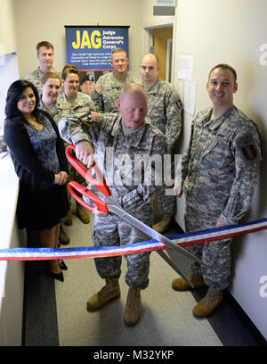 Army Lt. Col. Les Davis, Camp Mabry Garrison commander, right, and Jeff ...