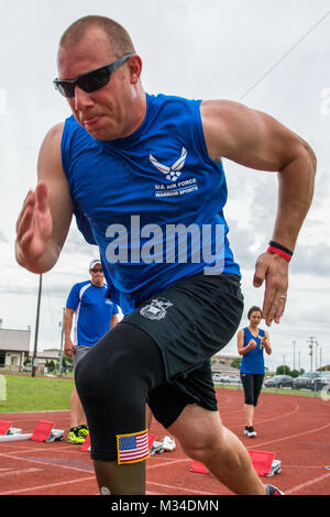 Benjamin Seekell, an Air Force wounded warrior athlete, laysup the ball ...