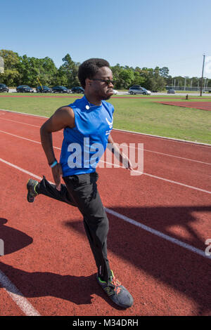 Ryan Cureton, an Air Force wounded warrior athlete, burst toward finish ...