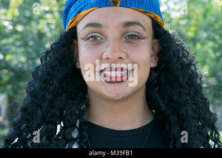Close-up of two African-style statues Stock Photo - Alamy