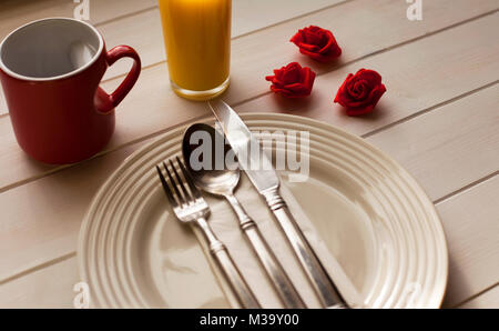 Breakfast table set for valentine's breakfast Stock Photo - Alamy
