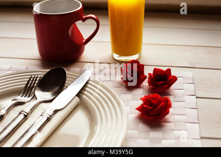 Place set for breakfast at Valentines Day Stock Photo - Alamy