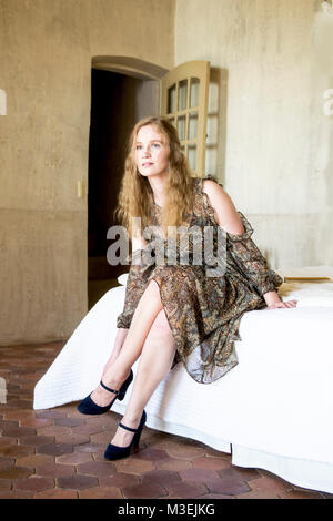 Beautiful young woman in french style clothes portrait Stock Photo - Alamy