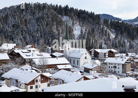 SCHEFFAU, AUSTRIA - JANUARY 18th, 2018: People enjoy the weather on the ...
