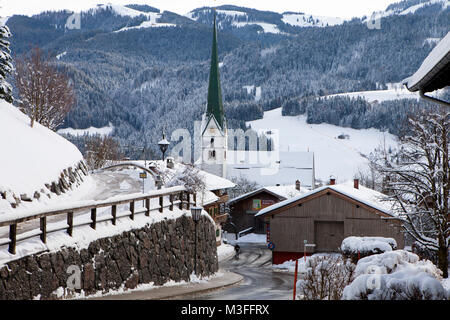 SCHEFFAU, AUSTRIA - JANUARY 18th, 2018: People enjoy the weather on the ...