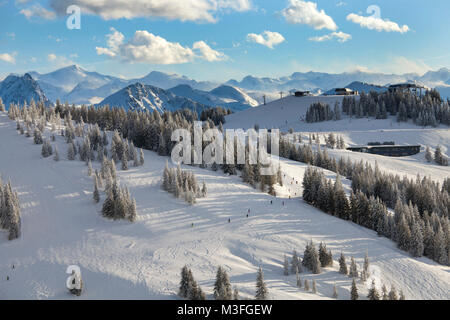 SCHEFFAU, AUSTRIA - JANUARY 18th, 2018: People enjoy the weather on the ...