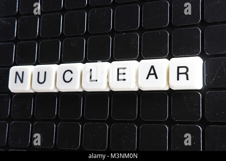 Nuclear text word title caption label cover backdrop background ...