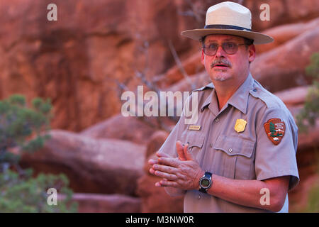 Arches National Park Rangers at work engaging with visitors Stock Photo ...