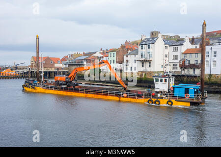 Excavation port maintenance dredger "Sandsend" in Whitby harbour Stock ...