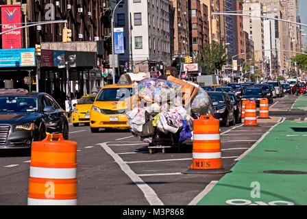 Homeless person's shopping trolley carts piled with all their ...