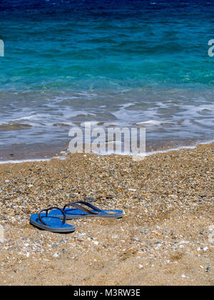 blue slippers near the sea Stock Photo - Alamy