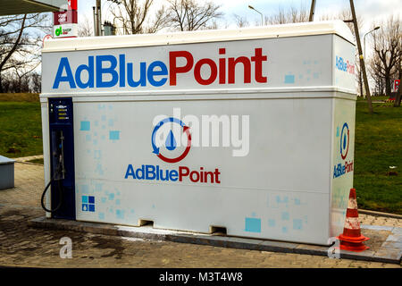 The AdBlue tank at the gas station on highway rest stop. AdBlue is a ...