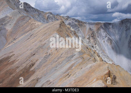 Sharp and dangerous rocks composed of sedimentary rocks Stock Photo - Alamy