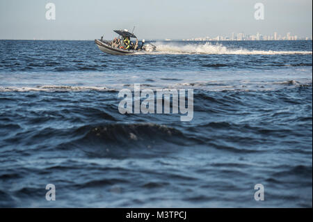 Joint Communication Support Element operators jump from a C-130 ...
