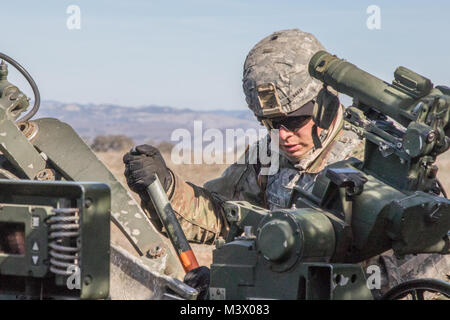 Soldiers of A Battery, 1-37 Field Artillery, hone their artillery ...