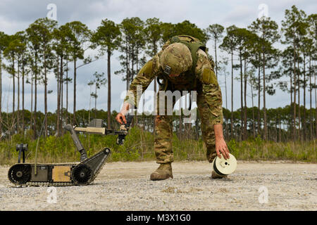 An iRobot 310 SUGV, Small Unmanned Ground Vehicle, is deployed carrying ...