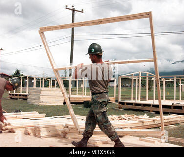 Hurricane Relief-5. A member of a naval mobile construction battalion ...