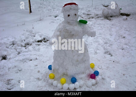 Ugly snowman made of snow in winter Stock Photo - Alamy