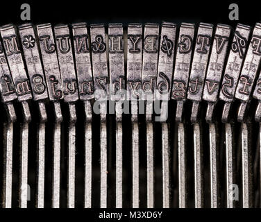 Macro of a old typewriter hammer Letter A Stock Photo - Alamy