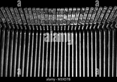 Macro detail of typescript inside electric typewriter Stock Photo - Alamy