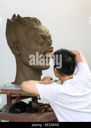 Artist hand working on a sculpture with a carver in a studio Stock ...