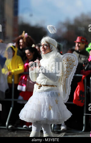 Cologne, Germany. 12th Feb, 2018. Revelers attend the Rose Monday ...