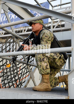 Master-at-Arms 2nd Class Anthony Revak and his wife pose for a photo ...