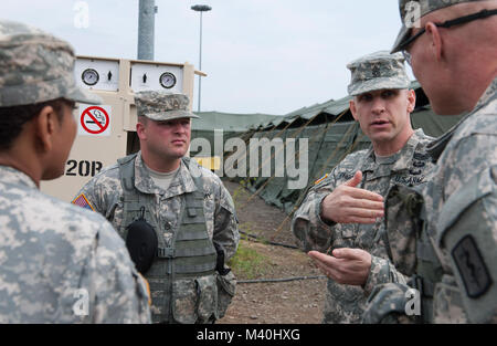 Command Sergeant Major (CSM) Rodney Rhoades (right), the 21st Theater ...