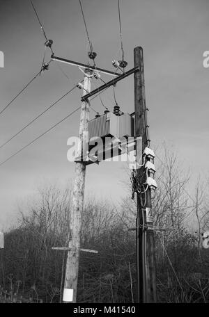 White electric box on a pole outside the house Stock Photo - Alamy