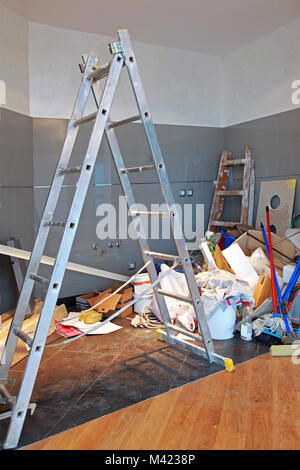 Big mess on floor during interior renovation Stock Photo - Alamy