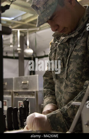 Soldiers from the Military Police Battalion during a cleaning ...