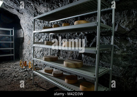 seasoning of cheese in the mine Stock Photo - Alamy