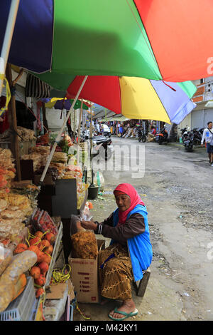 A female fruit and vegetable vendor at Candi Kuning Market.Bedugul.Bali ...