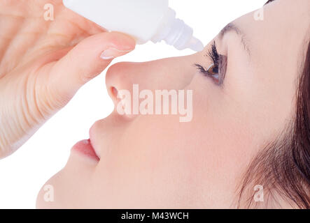 woman dripping eye with eyes drops Stock Photo - Alamy