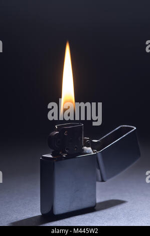Zippo lighter close-up on black background, macro Stock Photo - Alamy