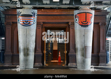Two of nine tile mosaic faces by David Lee Csicsko on street support ...