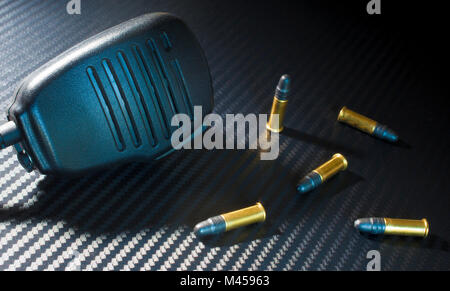 Rim fire ammunition with a police style microphone Stock Photo - Alamy