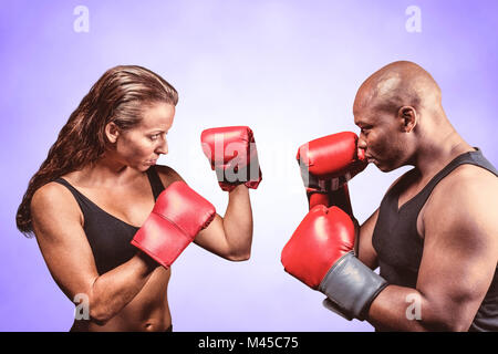 Composite image of athletes with fighting stance Stock Photo - Alamy