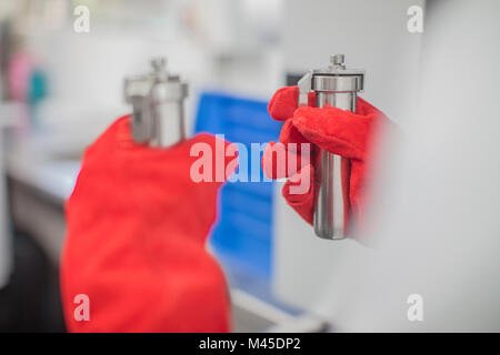 Beaker with red dye Stock Photo - Alamy