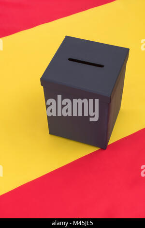 Black ballot box on Spanish flag - as metaphor for Spanish general ...