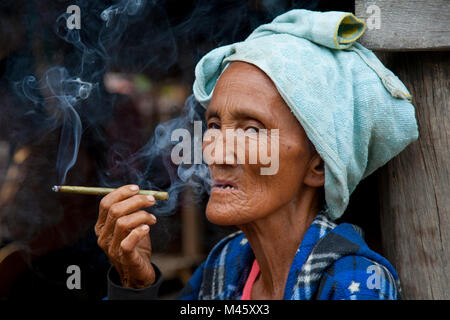 Burmese woman smoking a traditional cigar, Bagan (Pagan), Myanmar Stock ...