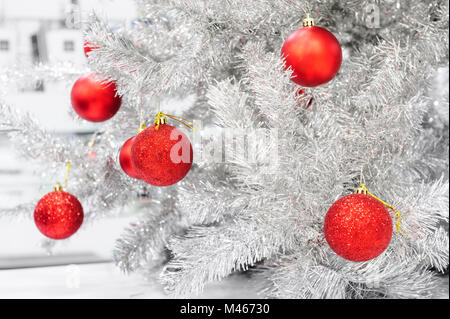 Silver and red Christmas baubles on rustic wooden background Stock ...