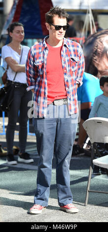 Johnny Knoxville watches as daughter Arlo Clapp takes on the climbing ...