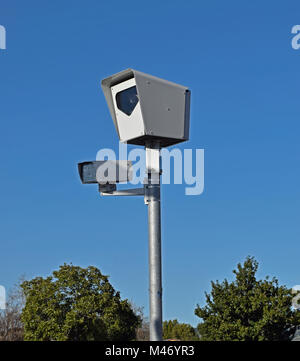 Traffic signal light with camera photographing traffic violations ...