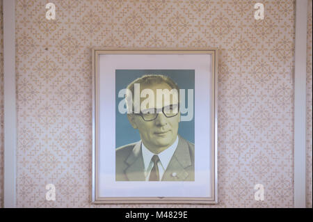 Exhibition with official portrait of Erich Honecker, East German ...